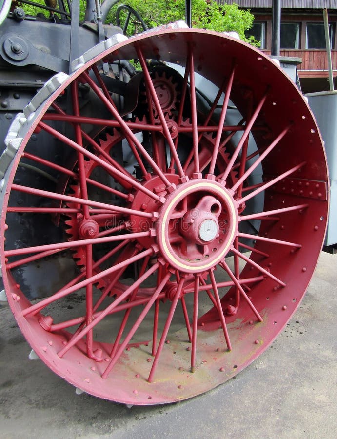 Red Wheel of an Old Steam-powered Tractor Stock Photo - Image of ...