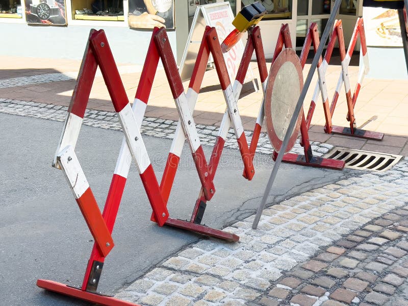 Red and White Barricade Blocking Urban Street Intersection for ...