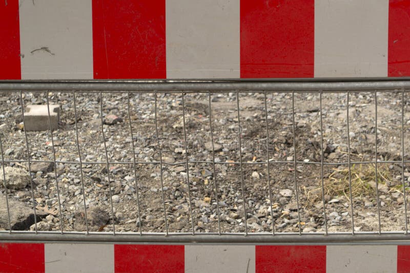 Red and White Barrier on a Construction Site Stock Image - Image of ...