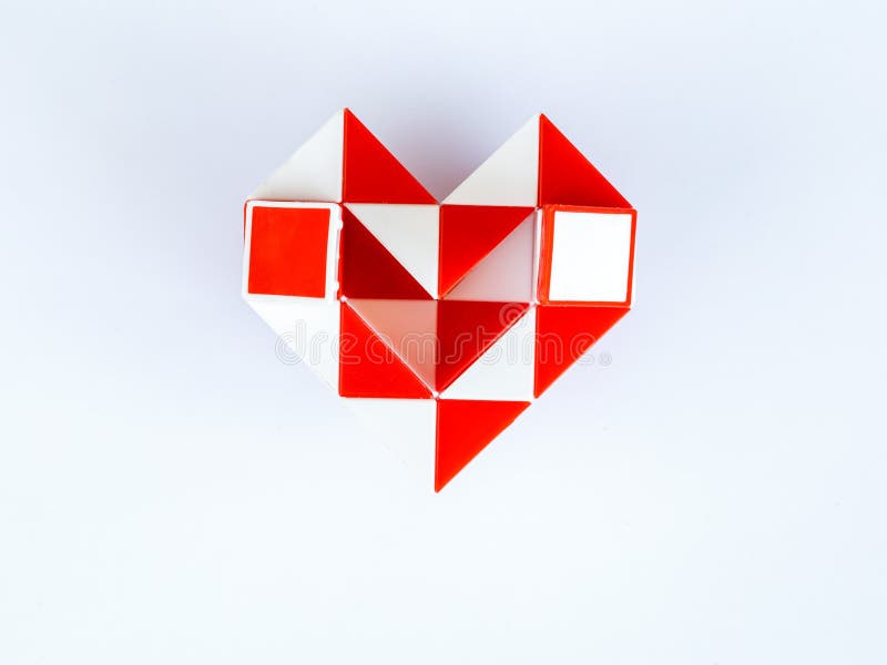 Red and White Bicolor Magic Snake Twist Puzzle in Shape of Heart ...