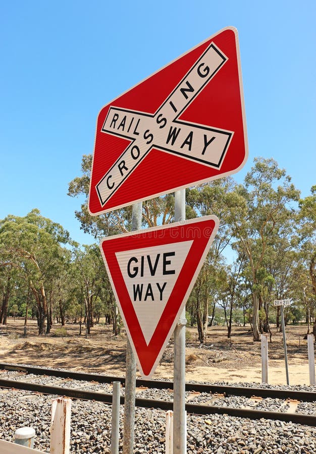 Give Way Railway Crossing Sign Stock Photo - Image of closeup, railway ...