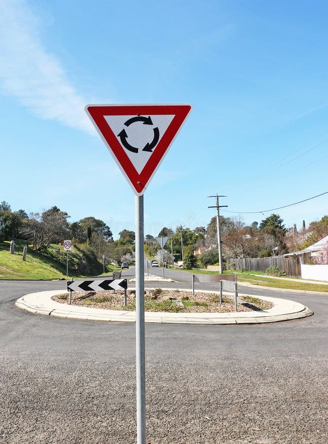 Red, White and Black Sign Indicating a Roundabout Ahead Stock Photo ...