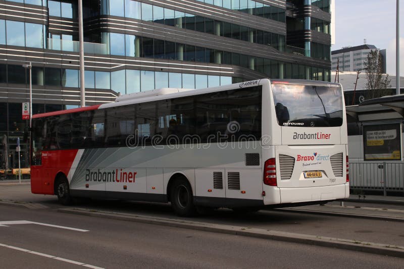 Red and White Brabantliner Bus at Platform for Fast Bus Transportation ...