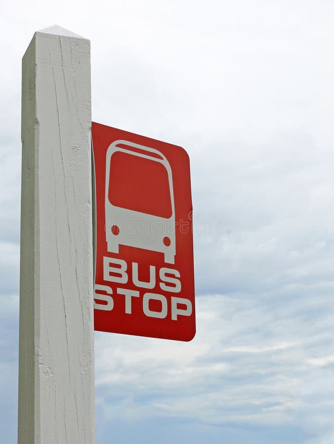 Red and White Bus Stop Sign Again a Gray Stormy Sky Stock Photo - Image ...