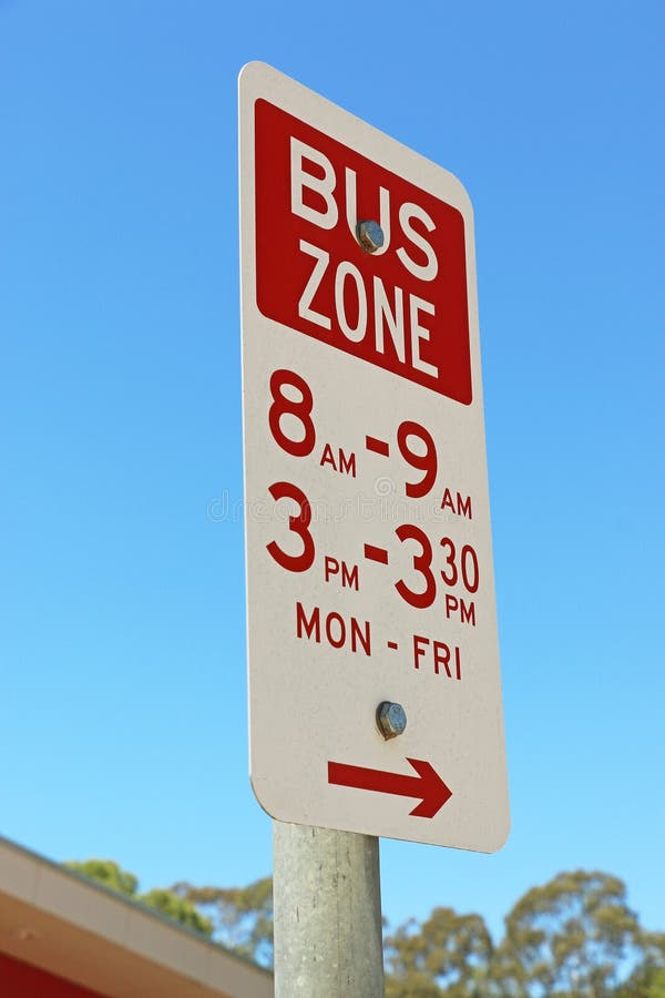 Red and White Bus Zone Sign in a Blue Sky Stock Image - Image of ...