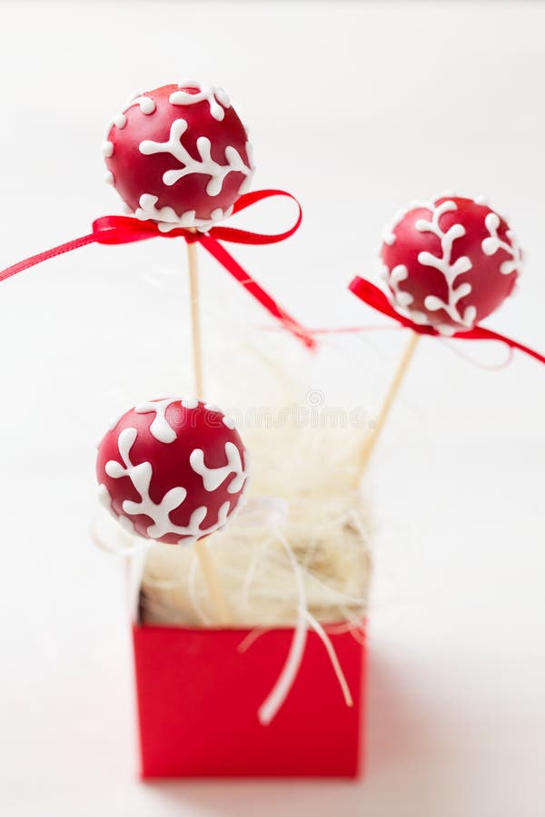 Red and white cake pops stock image. Image of gift, three - 77606647