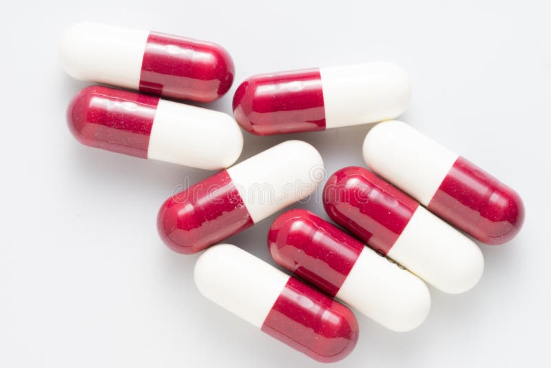 Red and white capsule pill stock photo. Image of health - 4316614