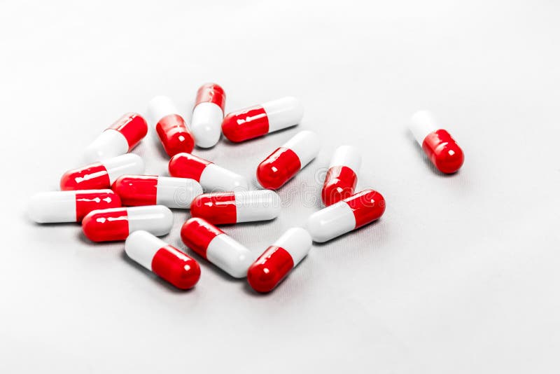 Red and white pills stock image. Image of medicine, sick - 104552673