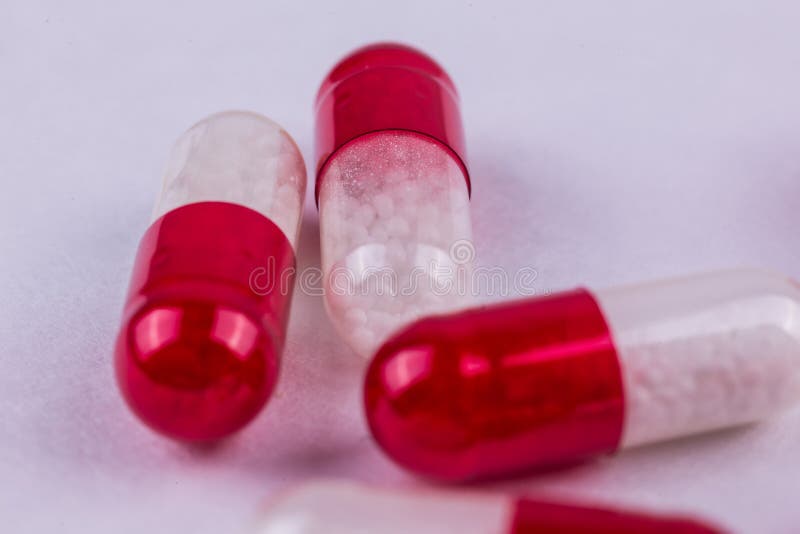 Red-white Capsules on a White Background Stock Image - Image of ...