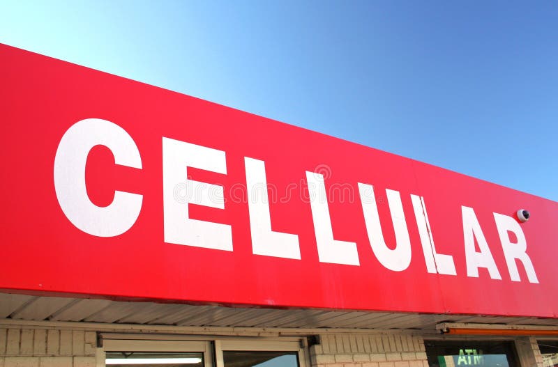 Red and White Cellular Phone Sign on Convenience Store Stock Photo ...