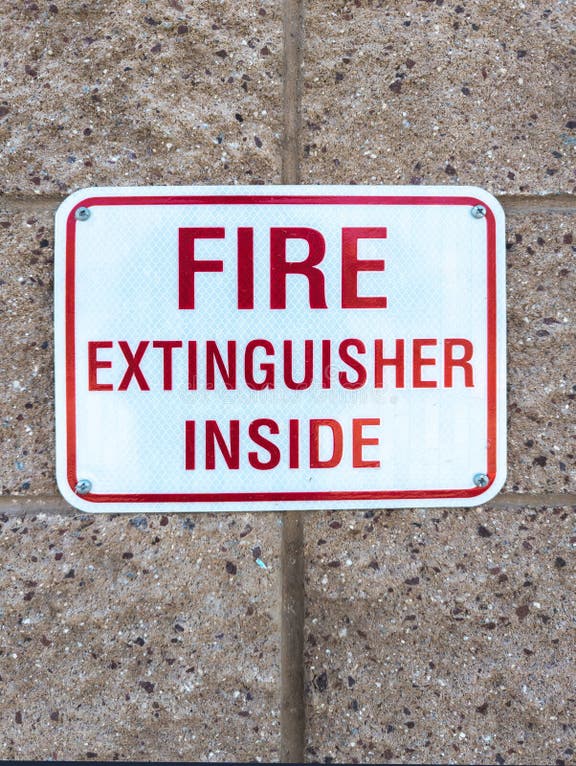 Red and White Fire Extinguisher Inside Sign Stock Photo - Image of ...