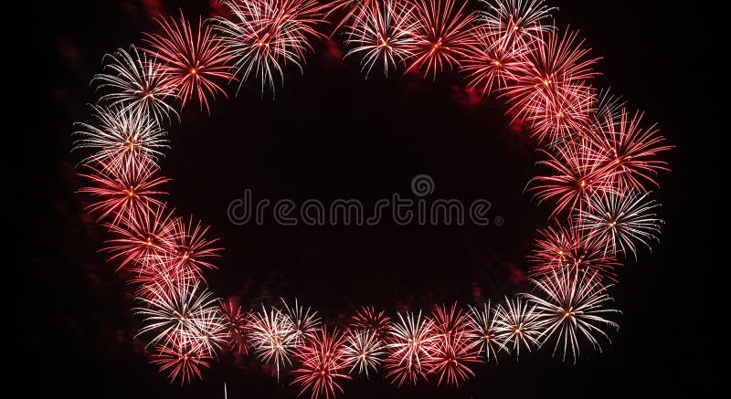 Red and White Fireworks Bursting Creating Oval Frame Against Dark Sky ...