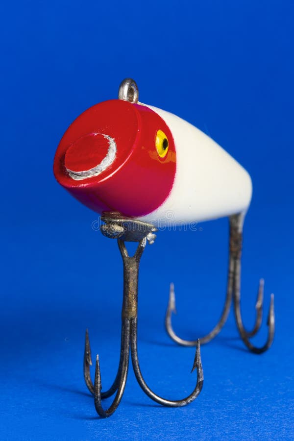 Red & White Fishing Lure stock image. Image of shallow - 31247535