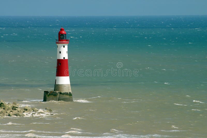 Red and white lighthouse. stock photo. Image of shingle - 344492