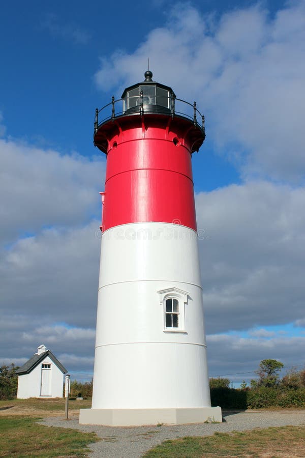 Red and white lighthouse stock image. Image of clouds - 38661501