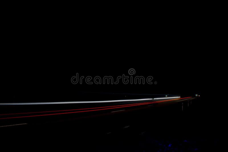 Red and White Lights from Passing Cars. Night Highway. Stock Photo ...