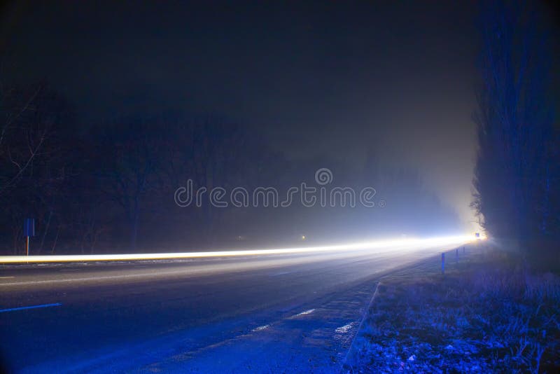 Red and White Lights from Passing Cars. Night Highway. Stock Photo ...