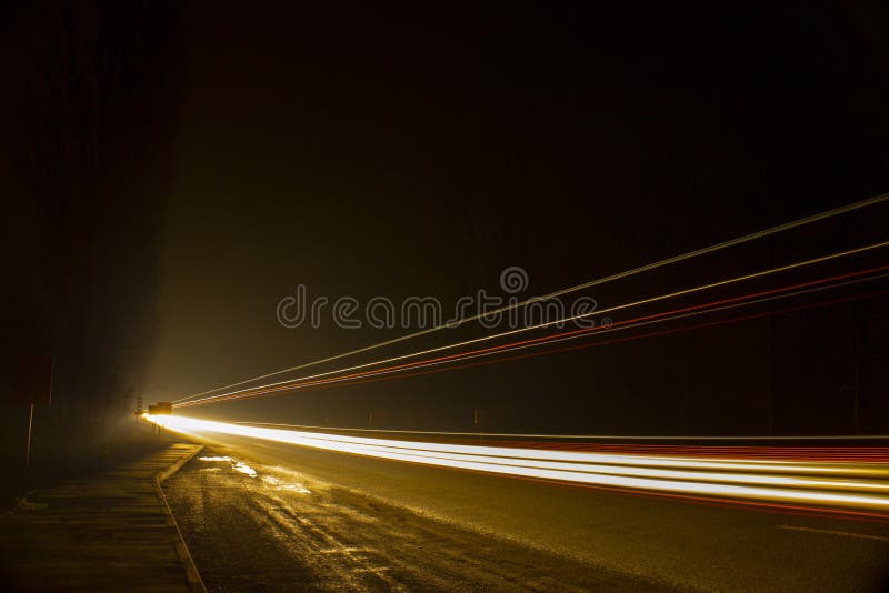 Red and White Lights from Passing Cars. Night Highway. Stock Photo ...
