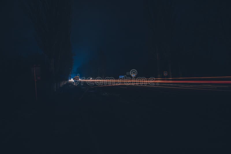 Red and White Lights from Passing Cars. Night Highway. Stock Photo ...