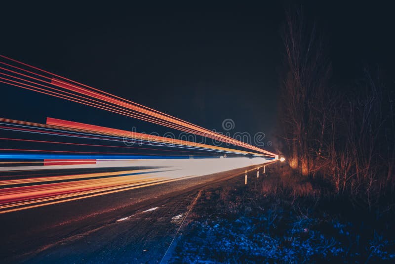 Red and White Lights from Passing Cars. Night Highway. Stock Image ...