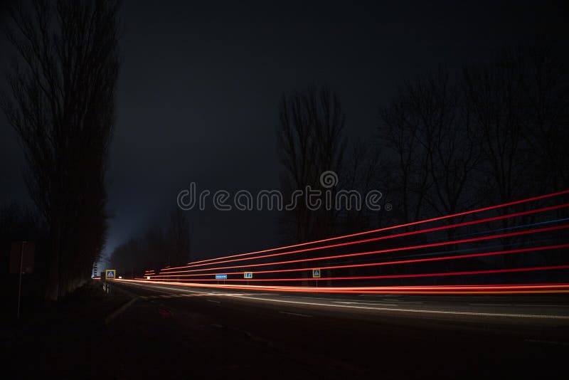 Red and White Lights from Passing Cars. Night Highway. Stock Image ...