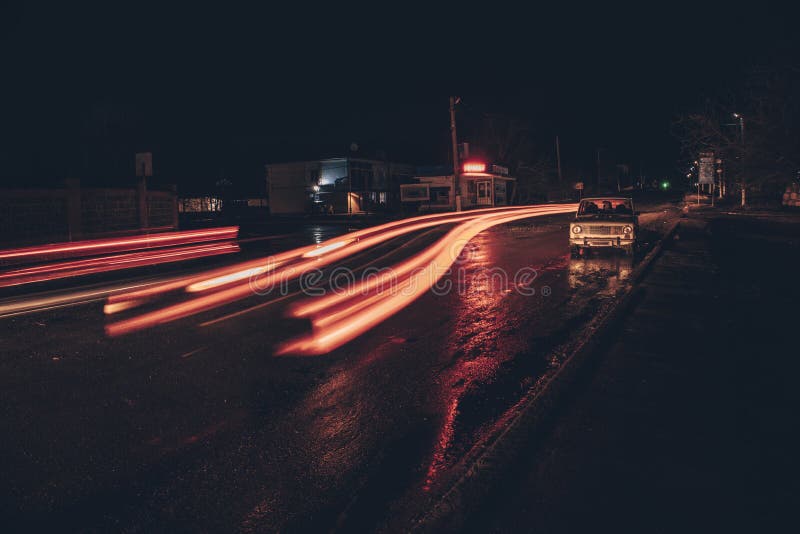 Red and White Lights from Passing Cars. Night Highway. Stock Photo ...