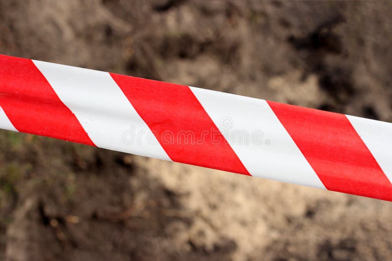 Red and White Lines of Barrier Tape that Forbids Passage, Protects for ...