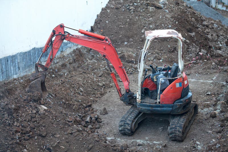 Mini Excavator on a Construction Site Stock Image - Image of road ...