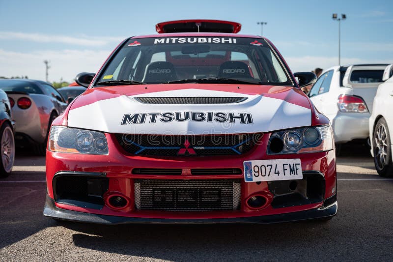 Red White Mitsubishi Lancer Evolution IX Parked at an Exhibition ...