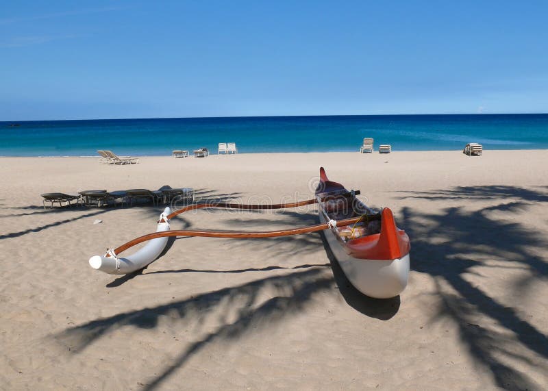 Red and White Outrigger on a Hawaiian Beach Stock Photo - Image of ...