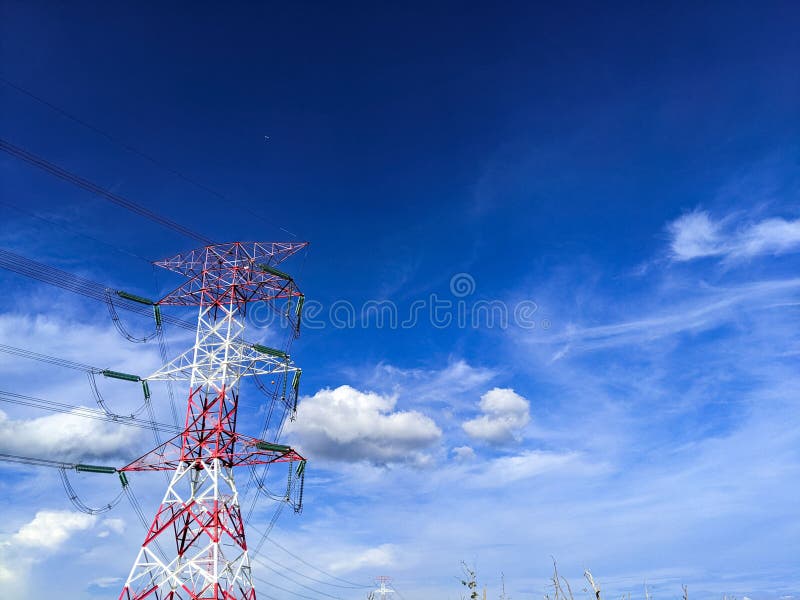 And White Painted Power Pole with Multiple High-voltage Power Lines ...