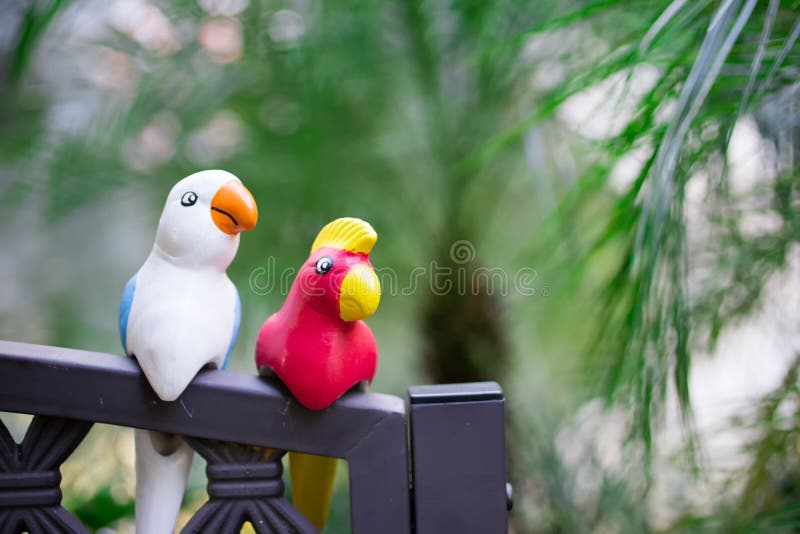 Red and White Parrot Statue on Blured Stock Photo - Image of interior ...