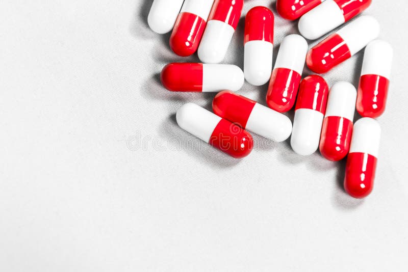 Red and white pills stock photo. Image of dose, antibiotics - 104551568