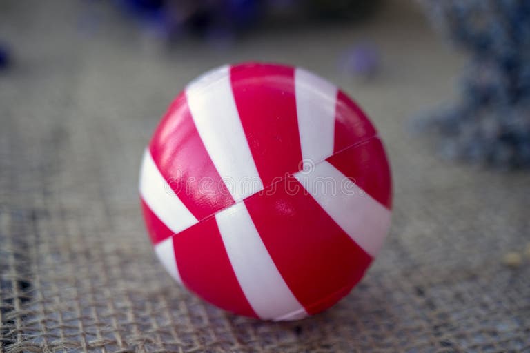 Red and white plastic ball stock image. Image of white - 239098431