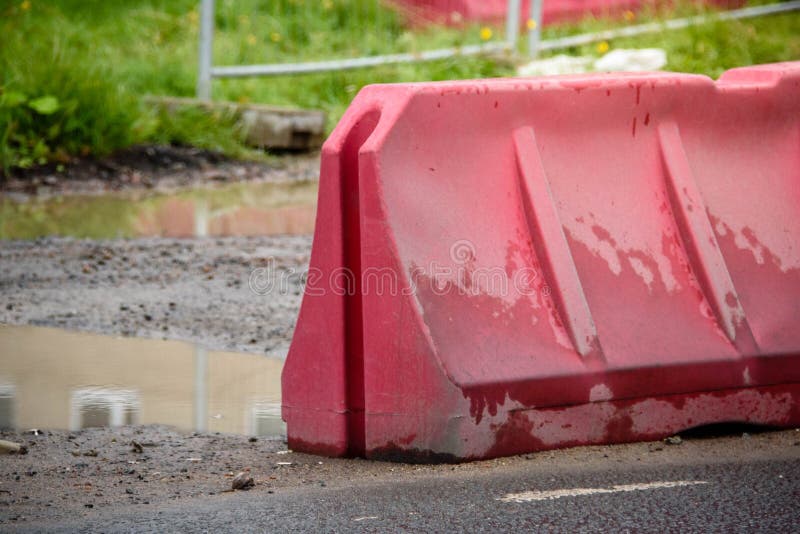 Red Plastic Barriers Standing on the Road. Stock Photo - Image of ...