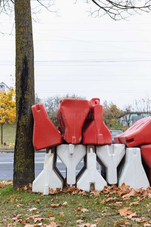Red and White Plastic Road Barriers. Construction Props Stock Image ...