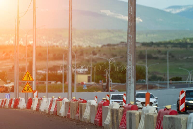 Red, White Plastic Safety Barriers Along Road. Ensuring Road Safety ...