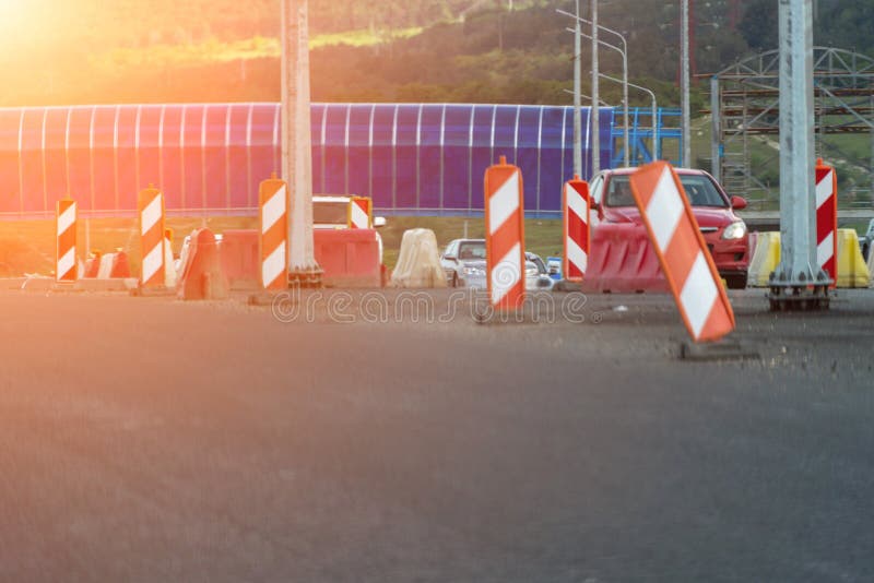 Red, White Plastic Safety Barriers Along Road. Ensuring Road Safety ...