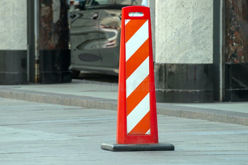 A Red and White Post that Prohibits Traffic Stands in the Middle of the ...