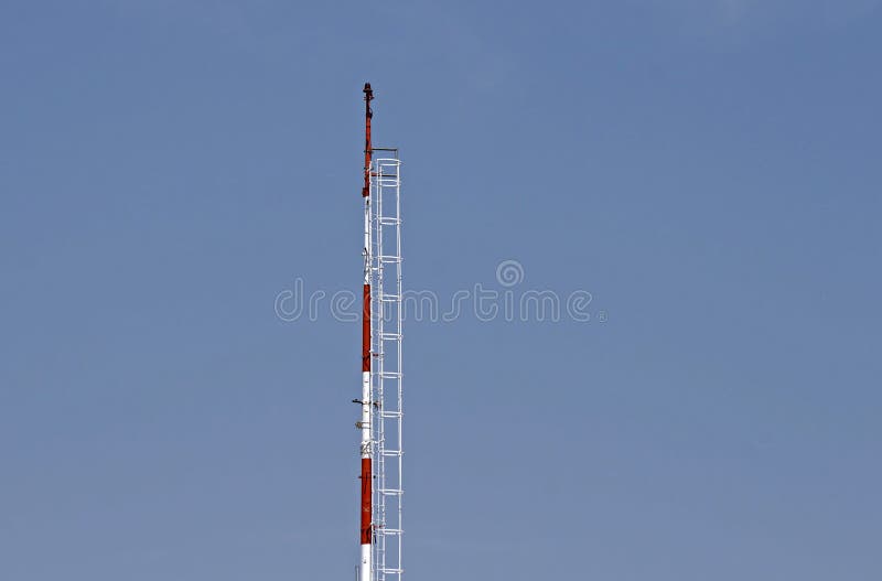 Red and White Radio Mast Against Blue Sky Stock Photo - Image of clear ...