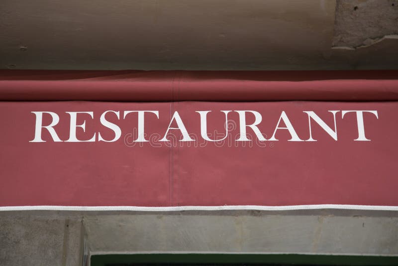 Restaurant Sign on Blue Door Stock Image - Image of font, azure: 62355919