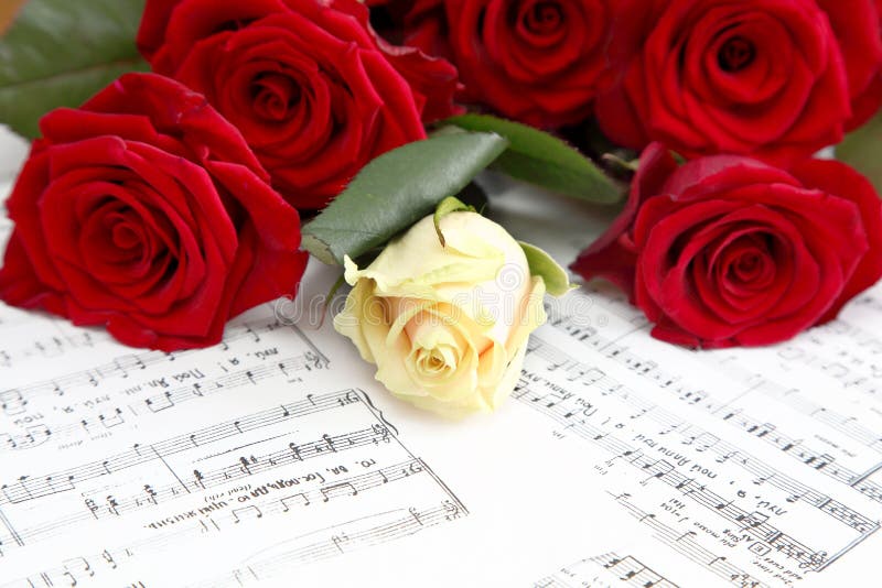 Two Pink Roses on Sheets of Musical Notes Stock Image - Image of note ...