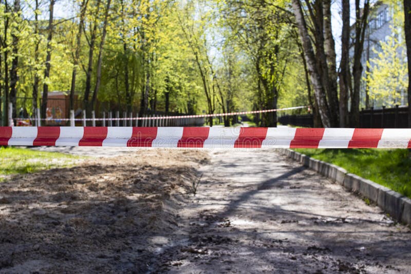 Red and White Safety Tape in the Park Stock Image - Image of stop, tape ...