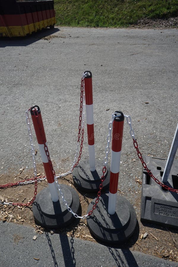 Red and White Security Fence with Chain on the Street Stock Photo ...