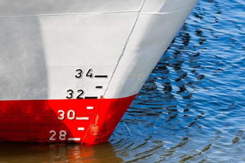 Red and White Ship Hull with Waterline and Draft Scale Measure Stock ...