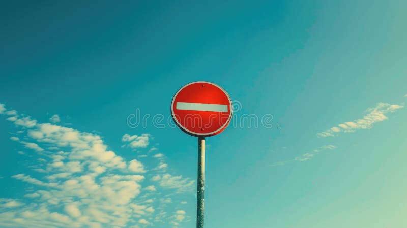 A Red and White Sign with a White Line through it is Standing in Front ...