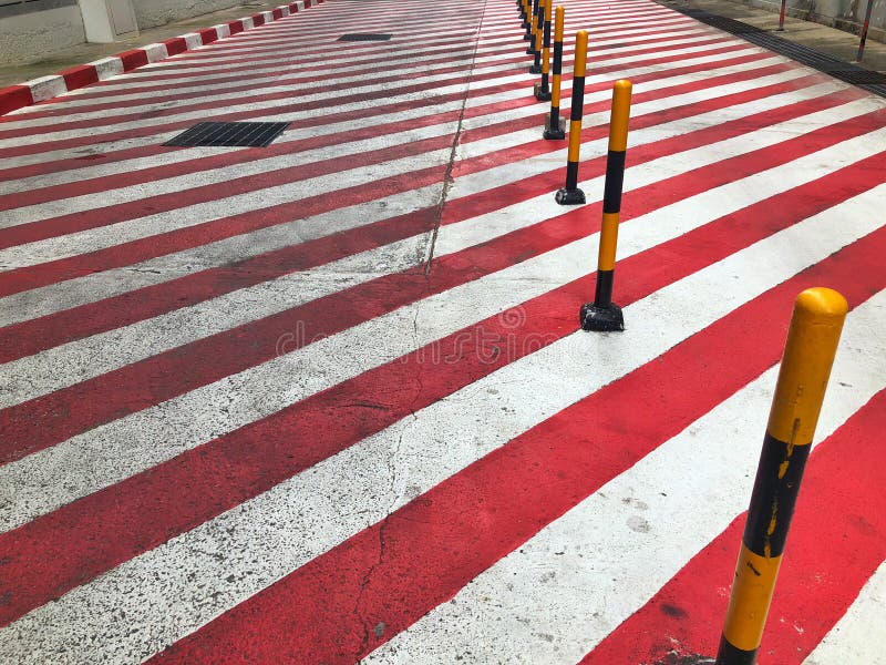 Red and White Sign with Yellow and Black Post for No Parking Area Stock ...