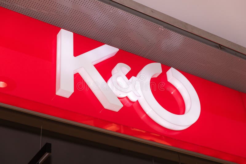 Red and White Storefront Sign with Large Bold Lettering Editorial ...