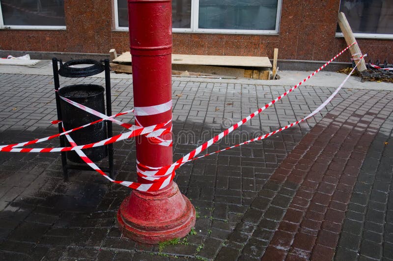 Red and White Striped Plastic Tape Restrict Access To Construction Site ...