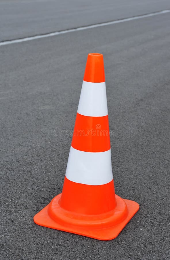 Red and White Striped Pylon Stock Image - Image of white, cone: 15740485